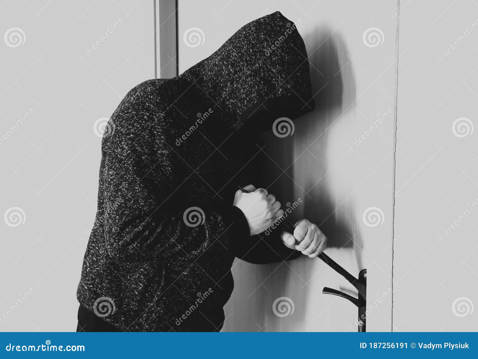 Criminal with Crowbar Near the Doors. Robber Breaking into House Stock ...