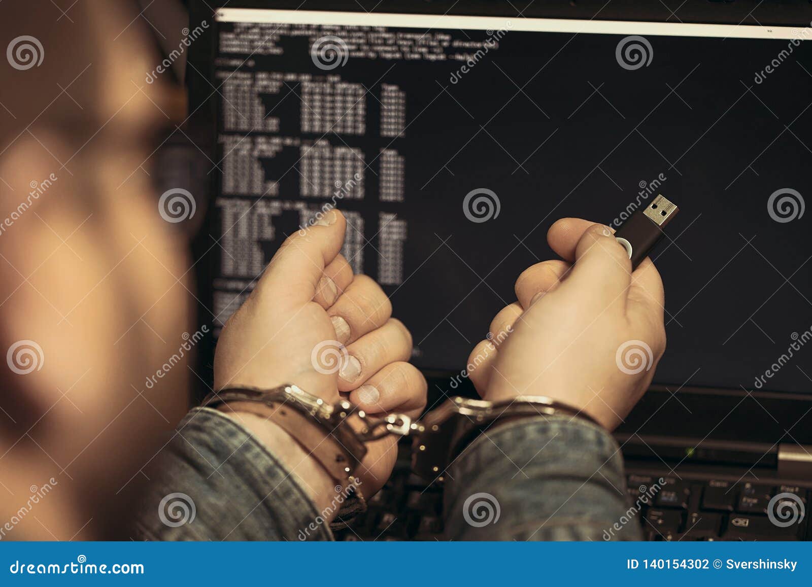 Criminal Hacker Hands Locked in Handcuffs. Close-up View Stock Photo ...