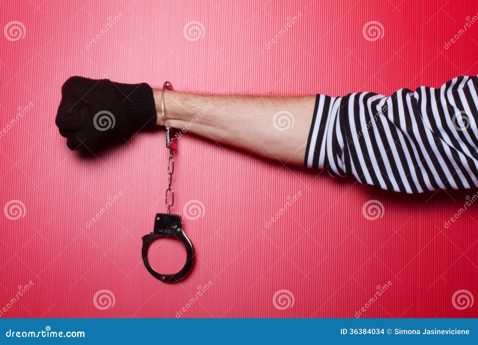 Criminal Hand Locked in Handcuffs Stock Photo - Image of guarded, hands ...