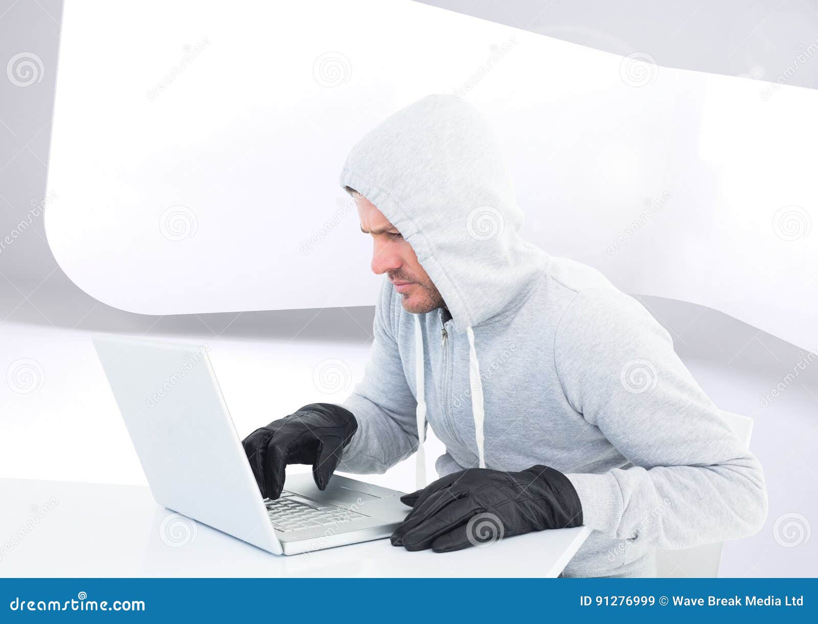 Criminal Man in Hood on Laptop in Front of Modern Background Stock ...