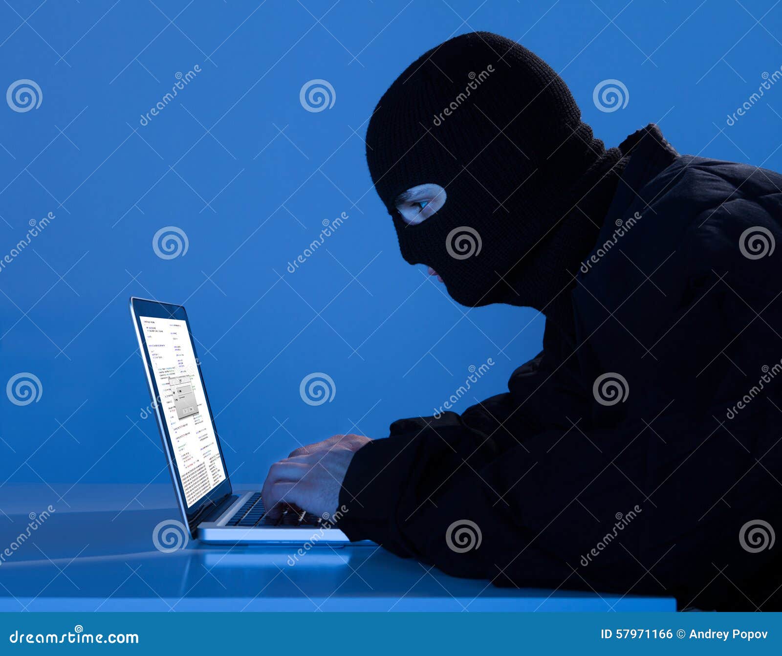 Criminal Using Laptop To Hack Data at Table Stock Photo - Image of ...
