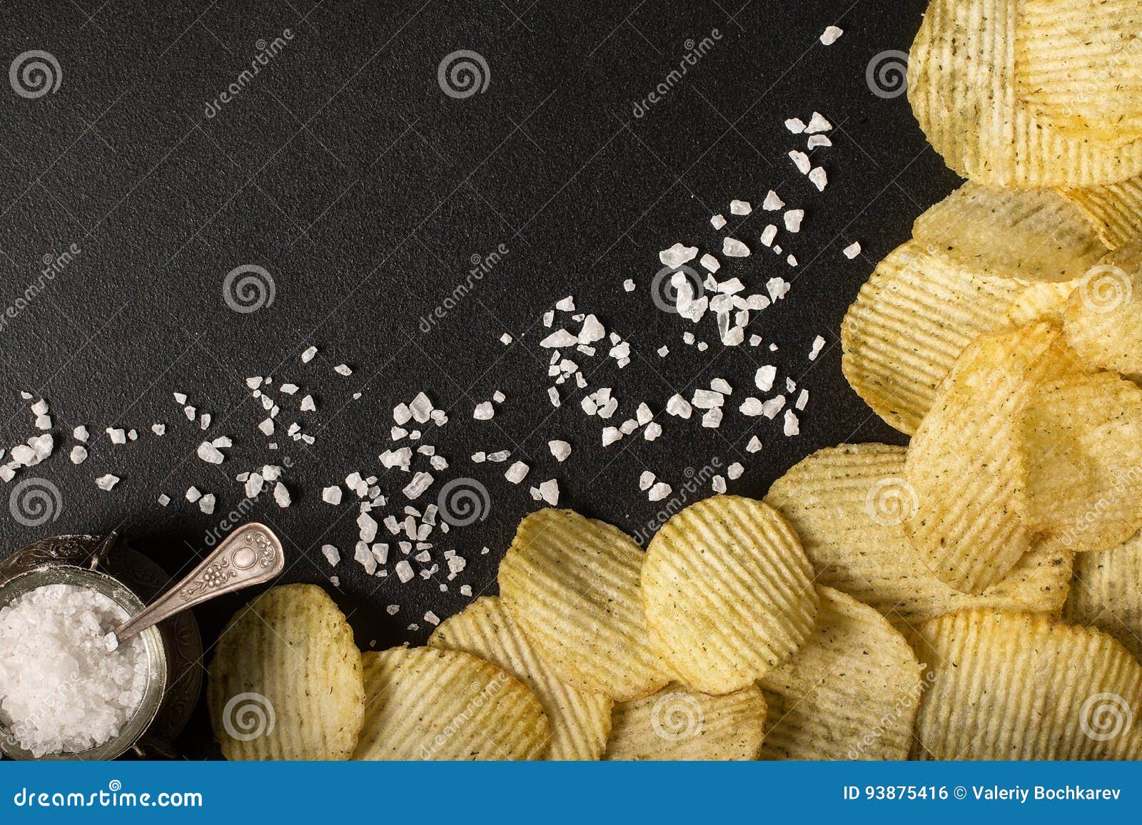 Crinkle Cut Potato Chips on Kitchen Table. Stock Photo - Image of food ...