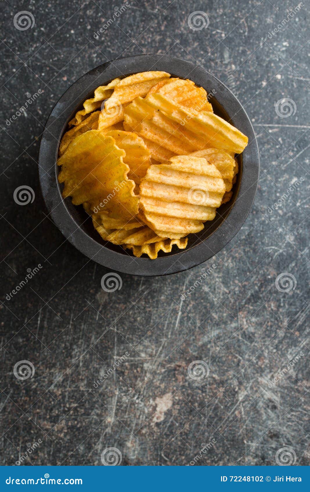 Crinkle cut potato chips. stock photo. Image of salt - 72248102