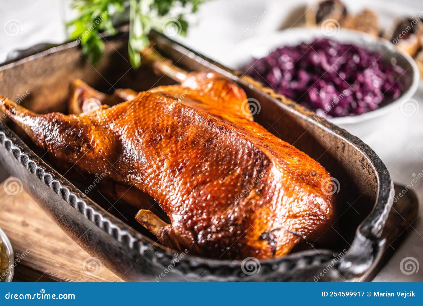 Crispy Baked Goose in an Original Baking Dish on the Festive Table ...