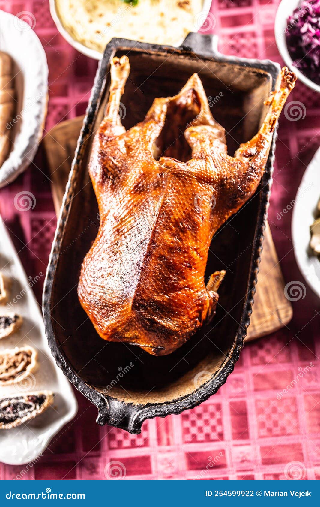 Crispy Baked Goose in an Original Baking Dish on the Festive Table ...