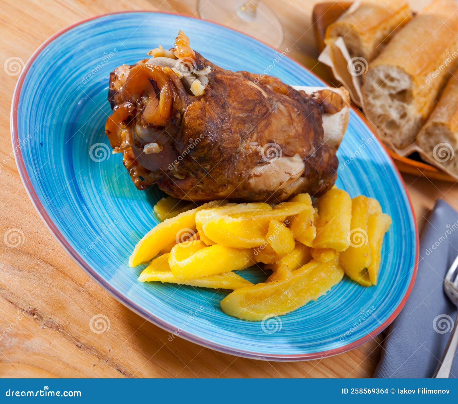 Crispy baked pork knuckle stock photo. Image of tender - 258569364