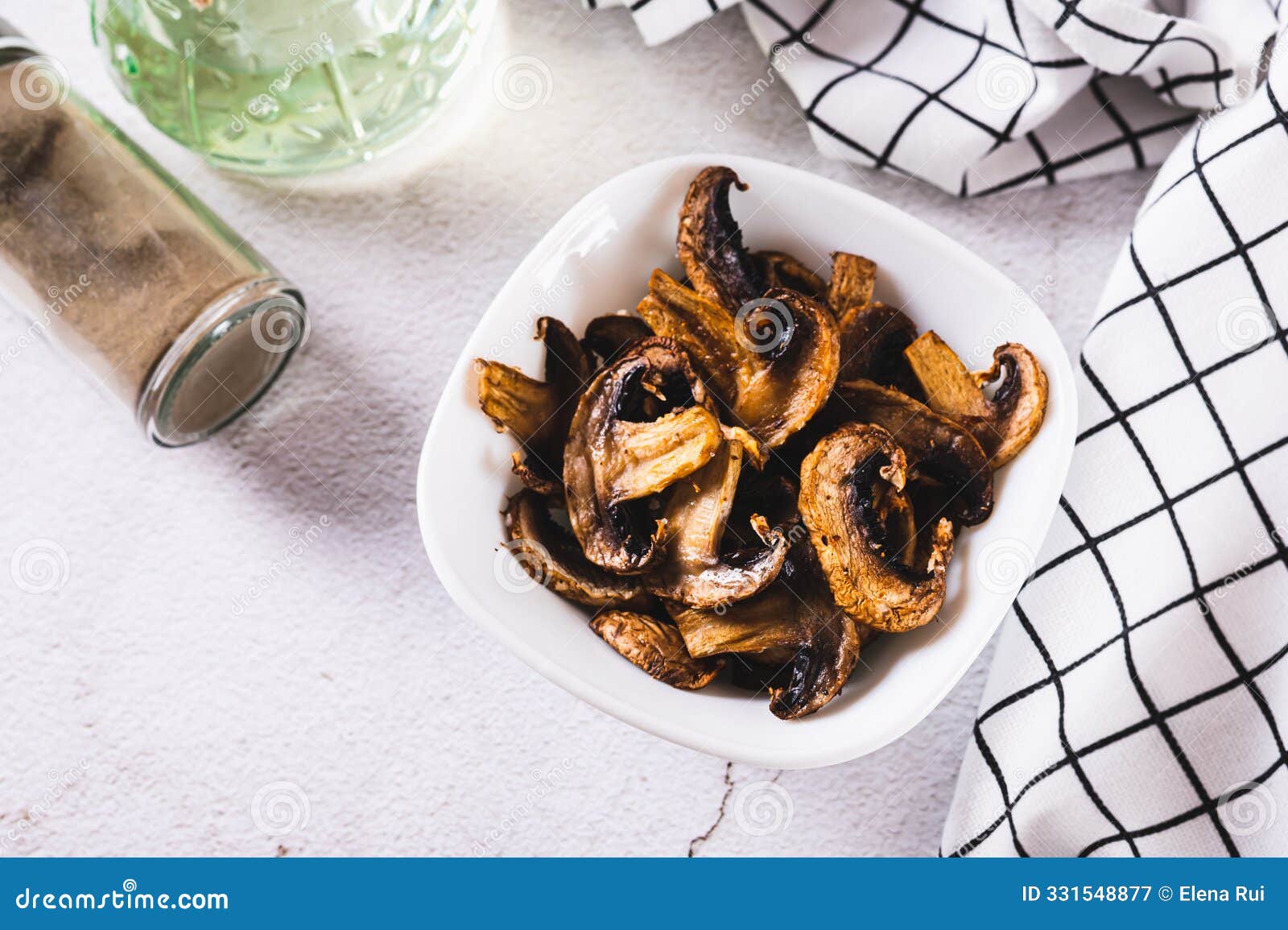 Crispy Baked Shiitake Chips with Spices in a Bowl on the Table Stock ...