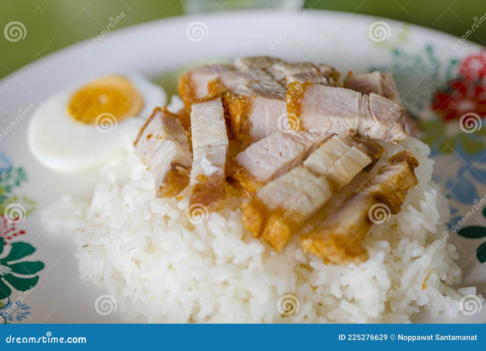 Crispy Belly Pork on Rice and Egg with Barbecue Red Sauce Stock Image ...