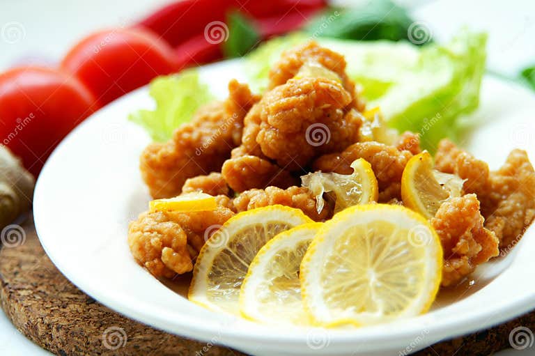 Crispy Chicken with Lemon stock image. Image of chef - 14078741