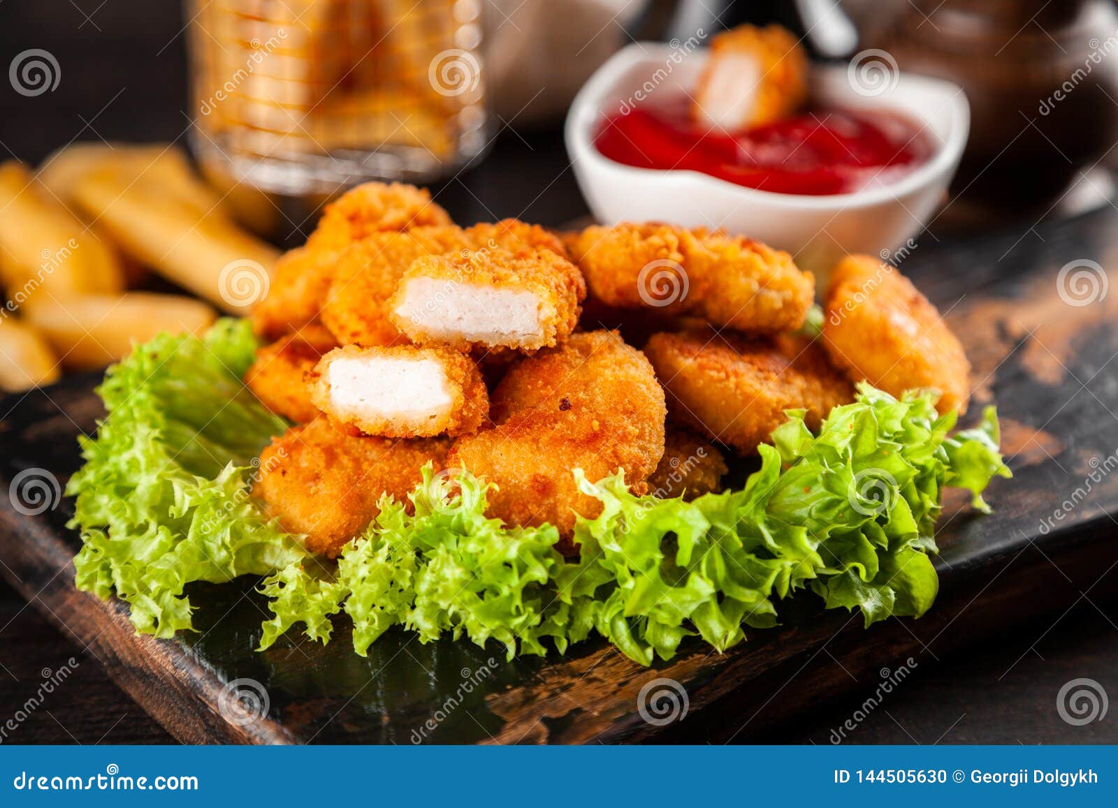 Crispy chicken nuggets stock photo. Image of fast, crispy - 144505630