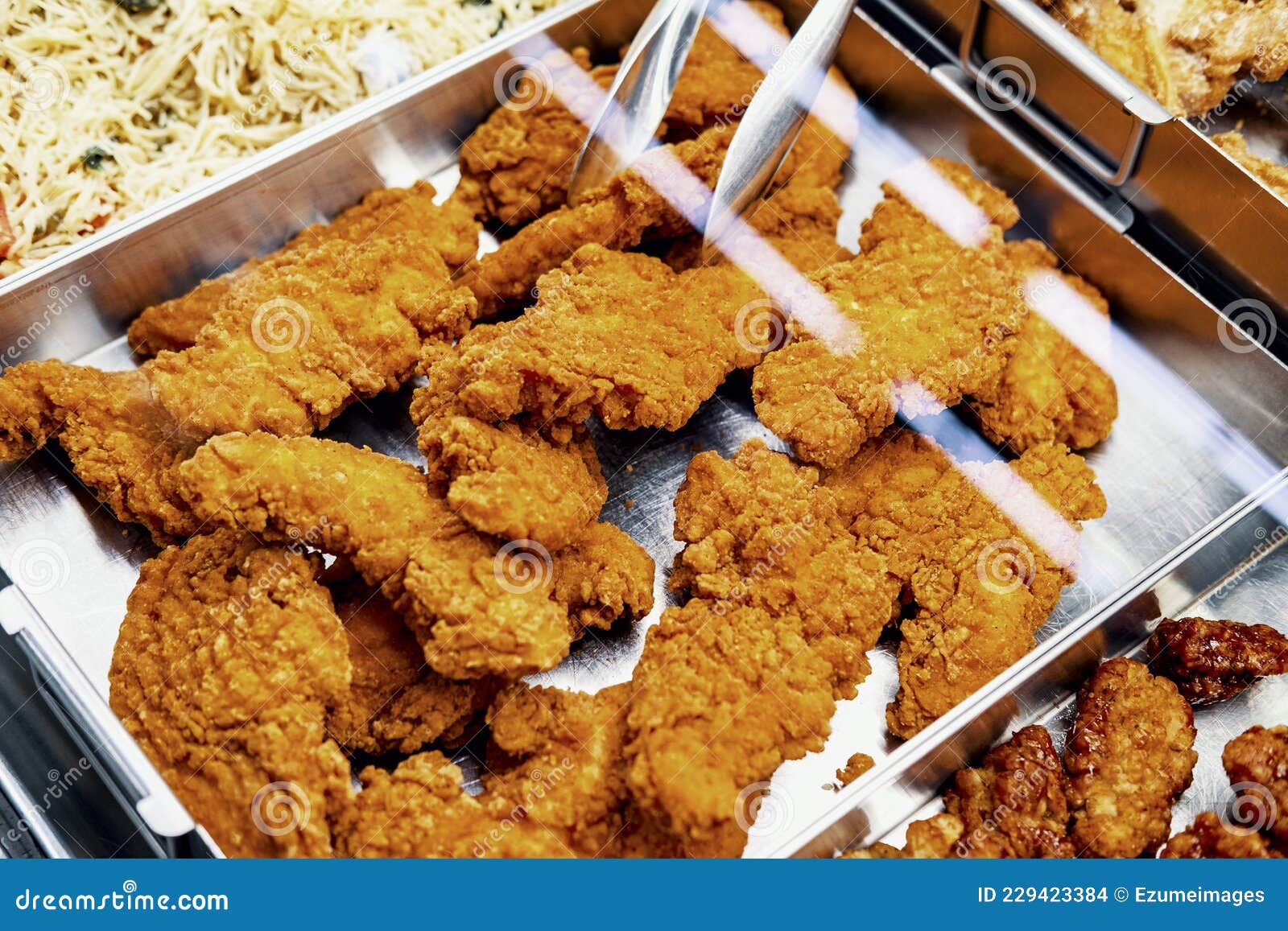 Crispy Chicken Tenders Buffet Stock Photo - Image of tray, food: 229423384