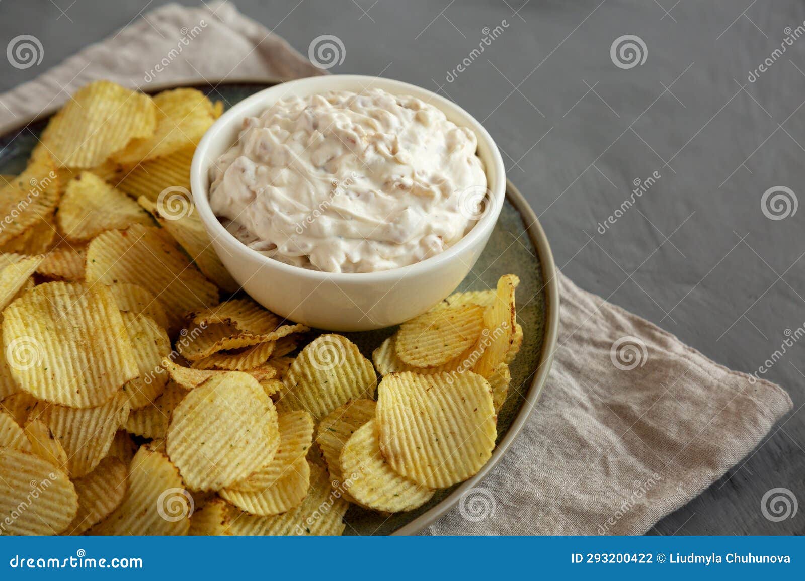 Crispy Crinkle Potato Chips and French Onion Dip on a Plate, Side View ...