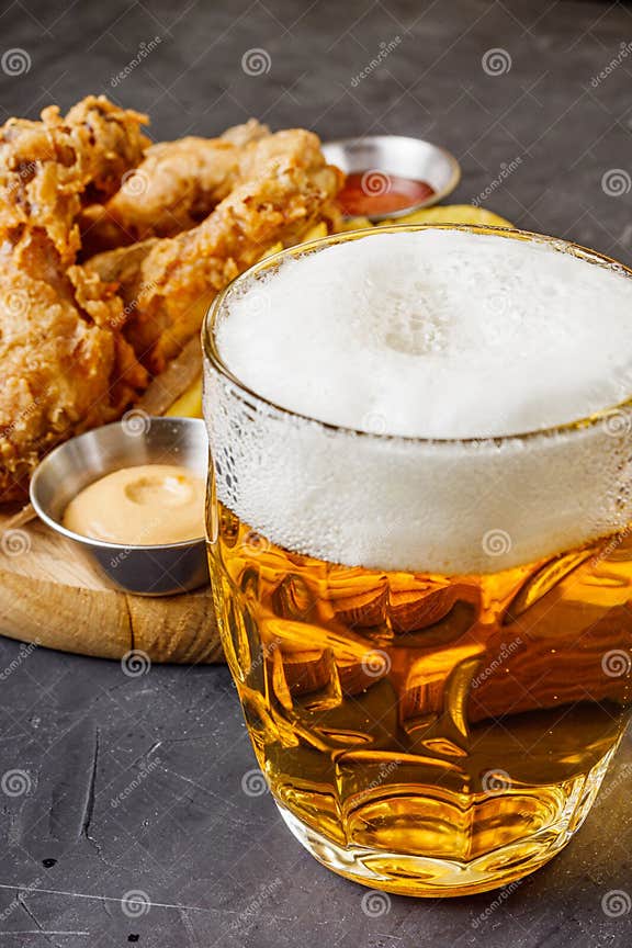 Crispy Deep-fried Chicken Drumsticks on a Black Background Stock Photo ...