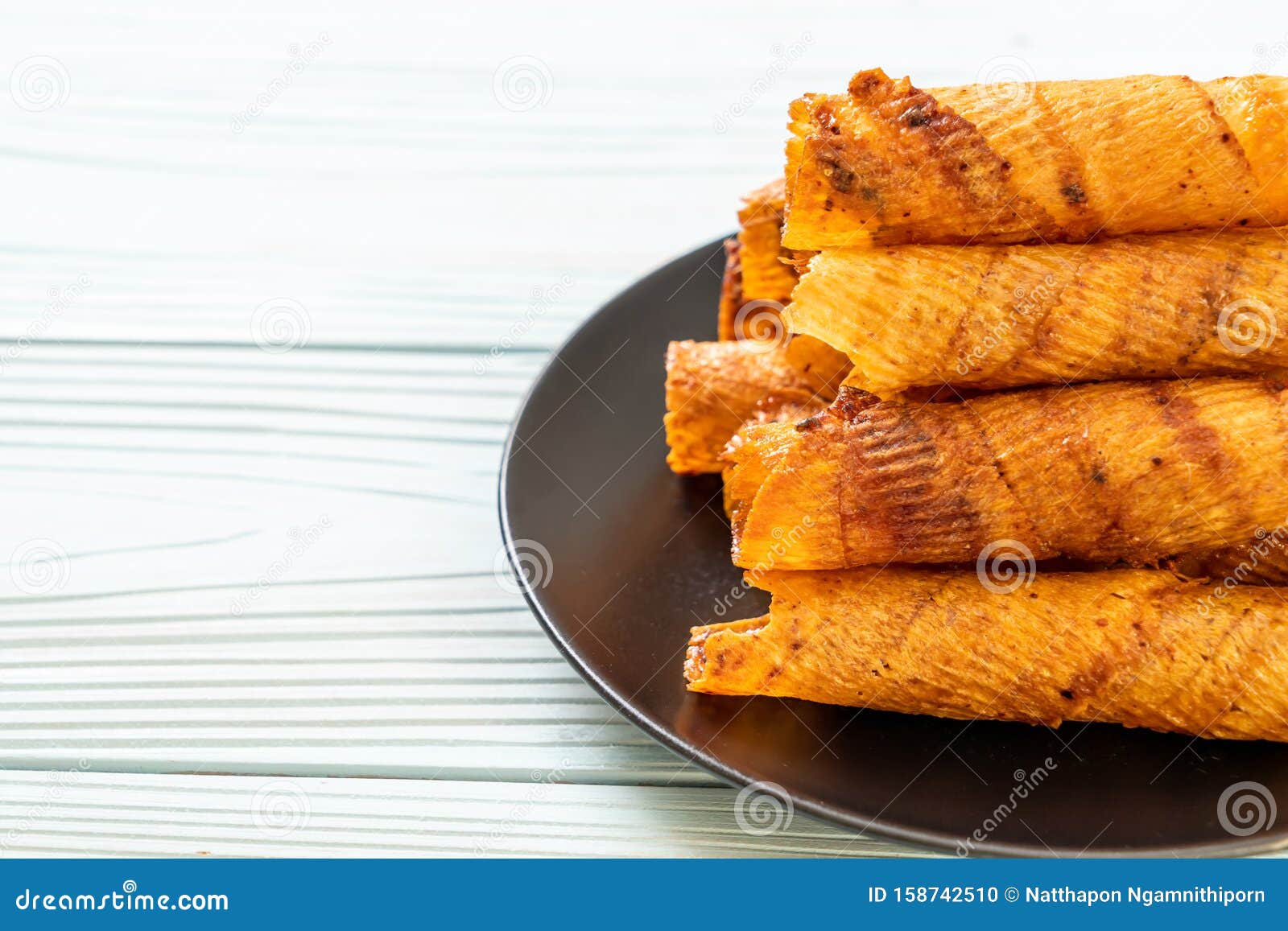 Crispy dried squid rolls stock photo. Image of animal - 158742510