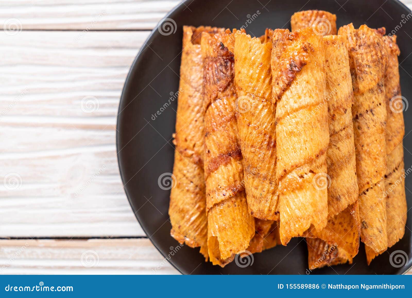 Crispy dried squid rolls stock photo. Image of freshness - 155589886