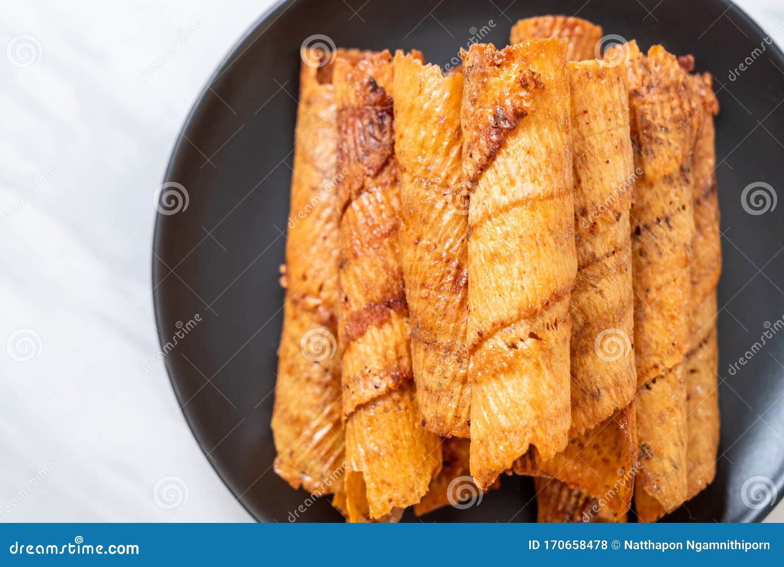 Crispy dried squid rolls stock photo. Image of frame - 170658478