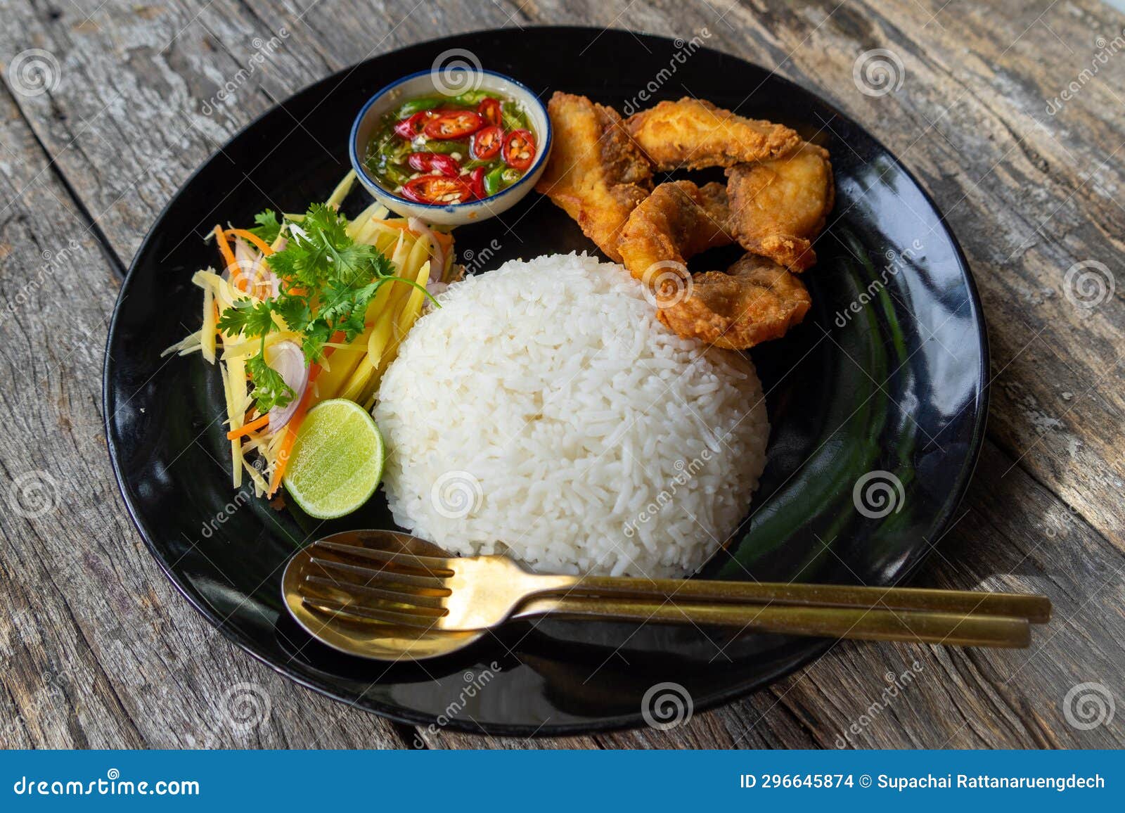 Rice fried fish stock photo. Image of green, bowl, cuisine - 296645874