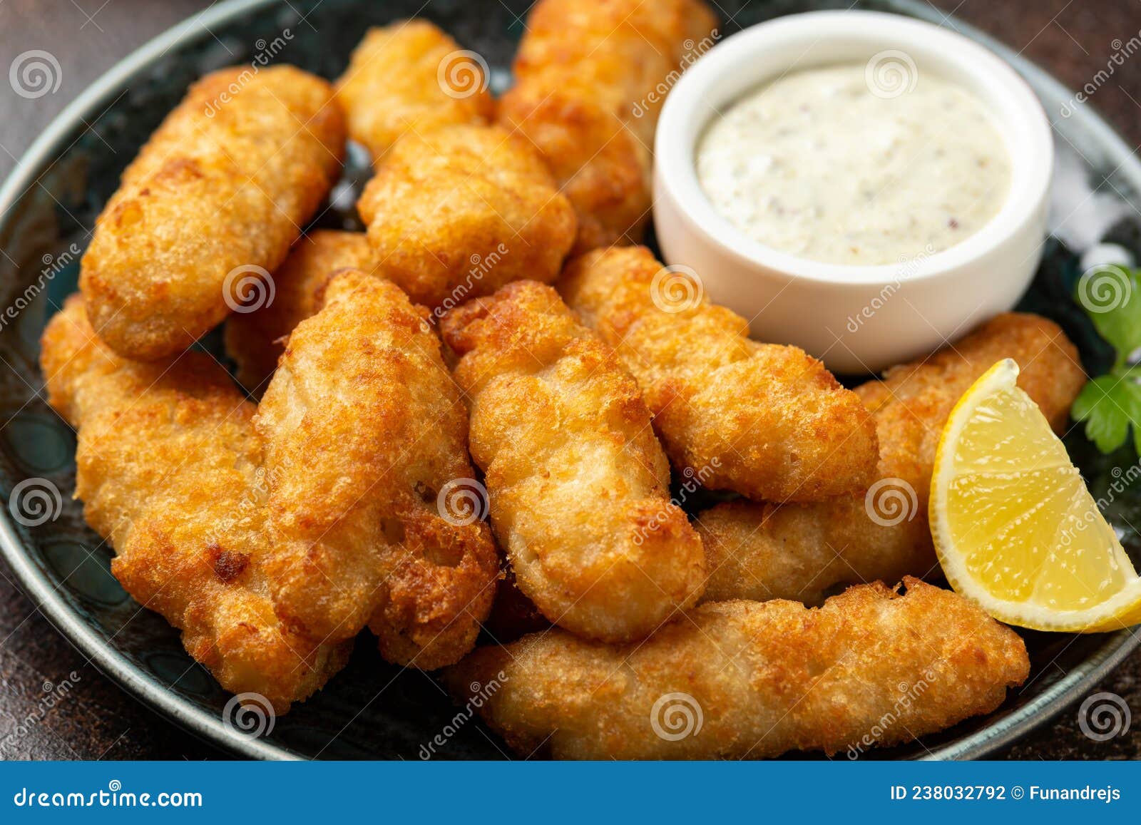 Crispy Fish Strips with Tartar Sauce in a Plate Stock Photo - Image of ...