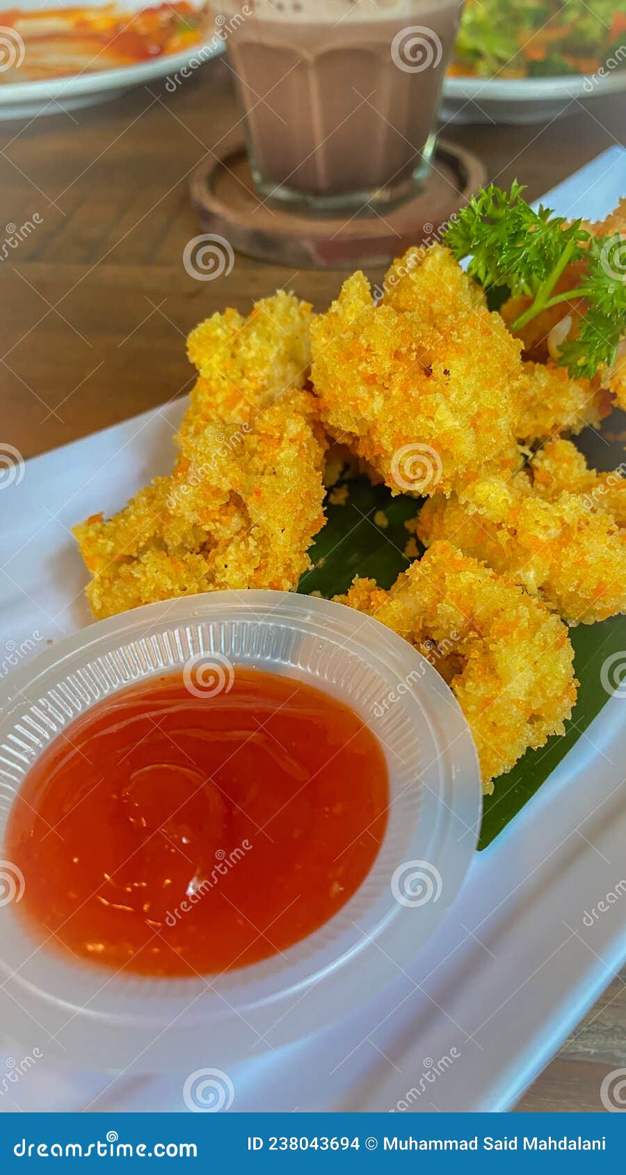 Crispy Fried Calamari on a Plate. Stock Photo - Image of chips, sauce ...