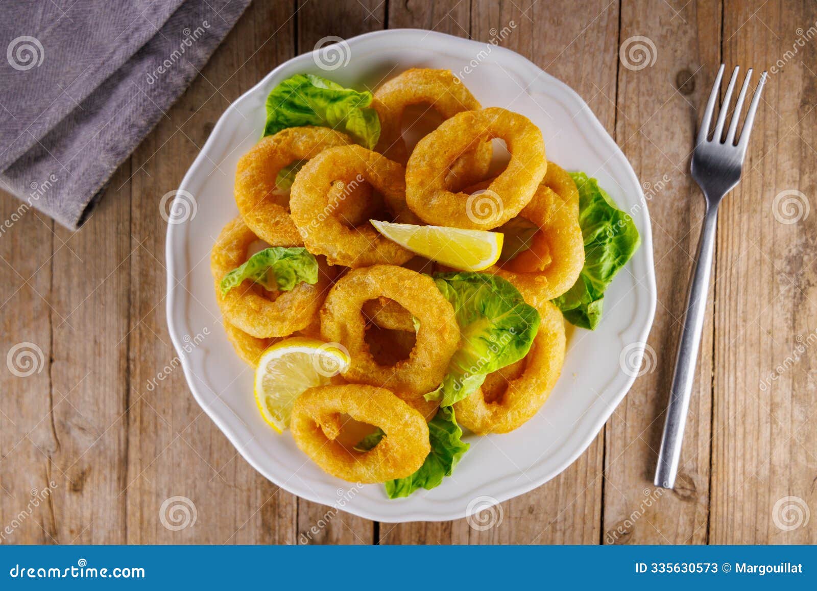 Crispy Fried Calamari Rings with Lemon Stock Image - Image of snack ...