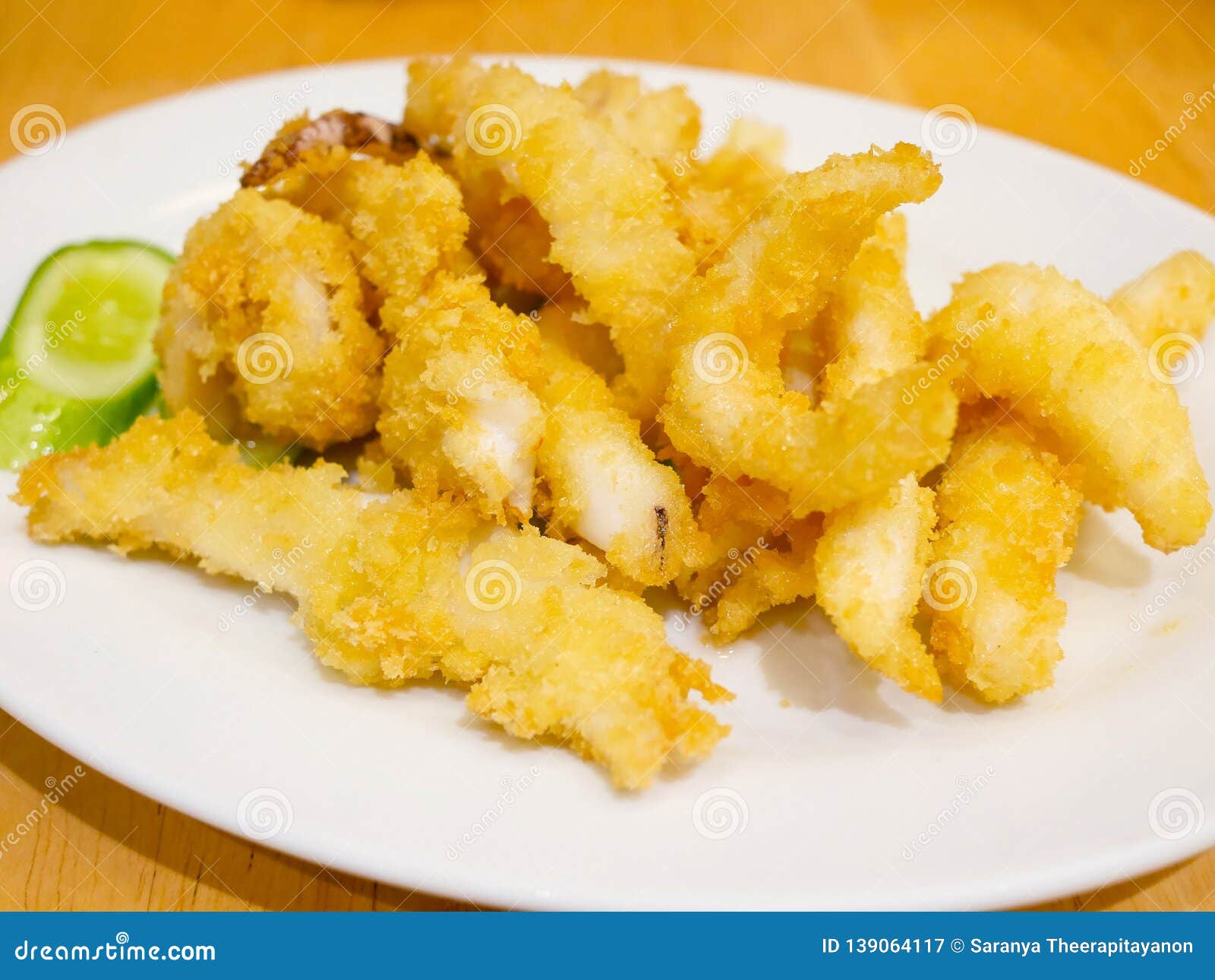 Crispy fried calamari stock image. Image of cuisine - 139064117