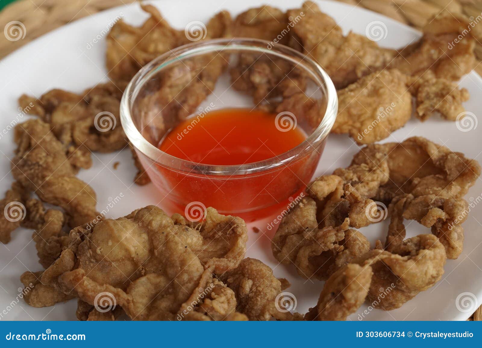 Crispy Fried Chicken Skin on Plate with Sauce Stock Photo - Image of ...