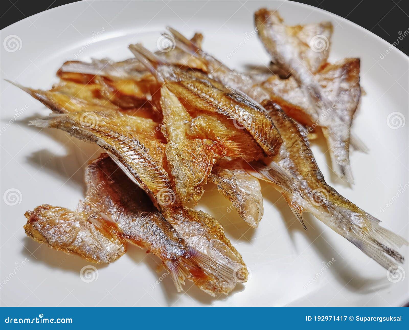 Crispy Fried Salted Fish on White Plate Stock Image - Image of bone ...