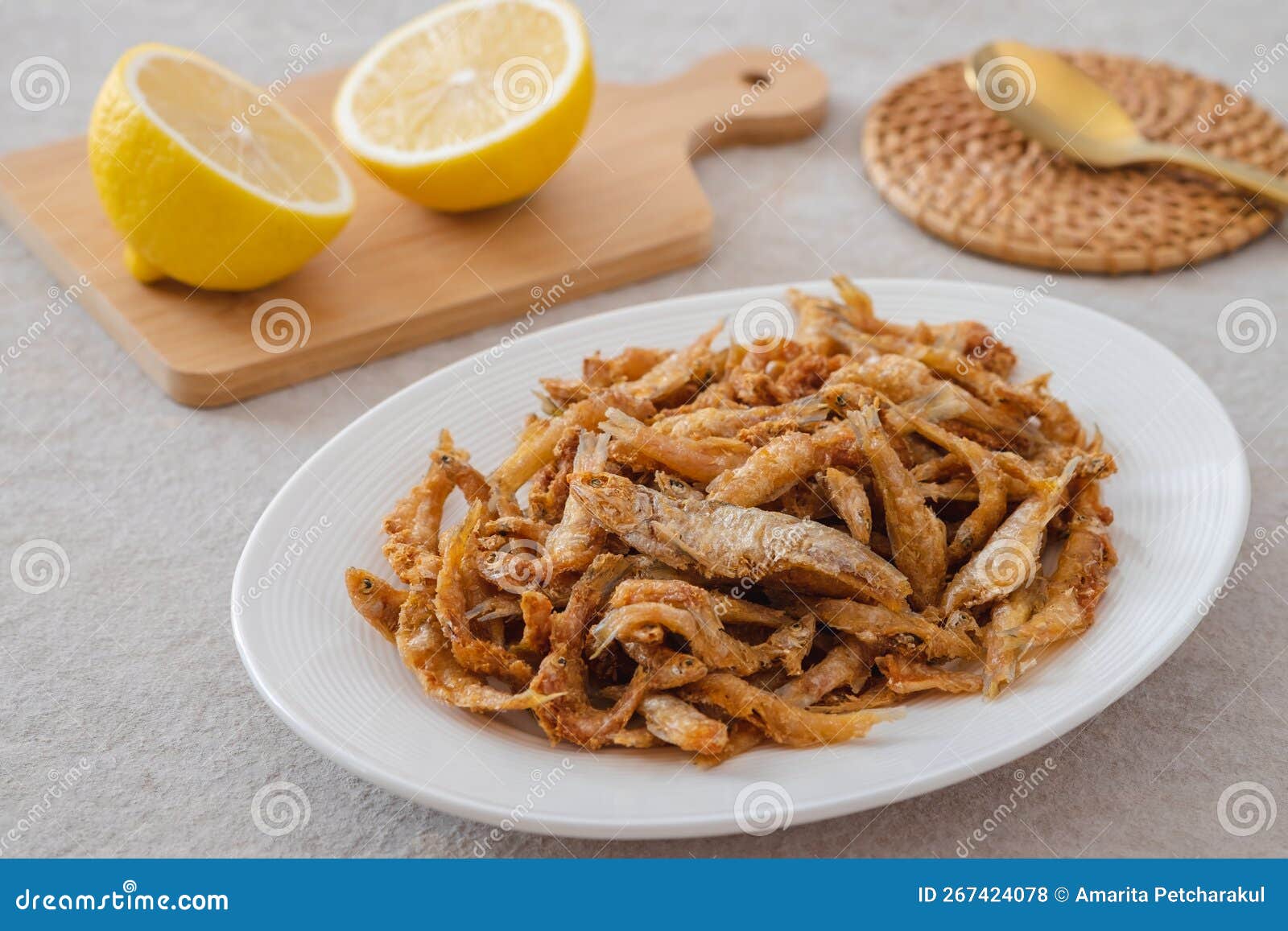 Crispy Fried Small Fish on White Plate Stock Photo - Image of nutrition ...