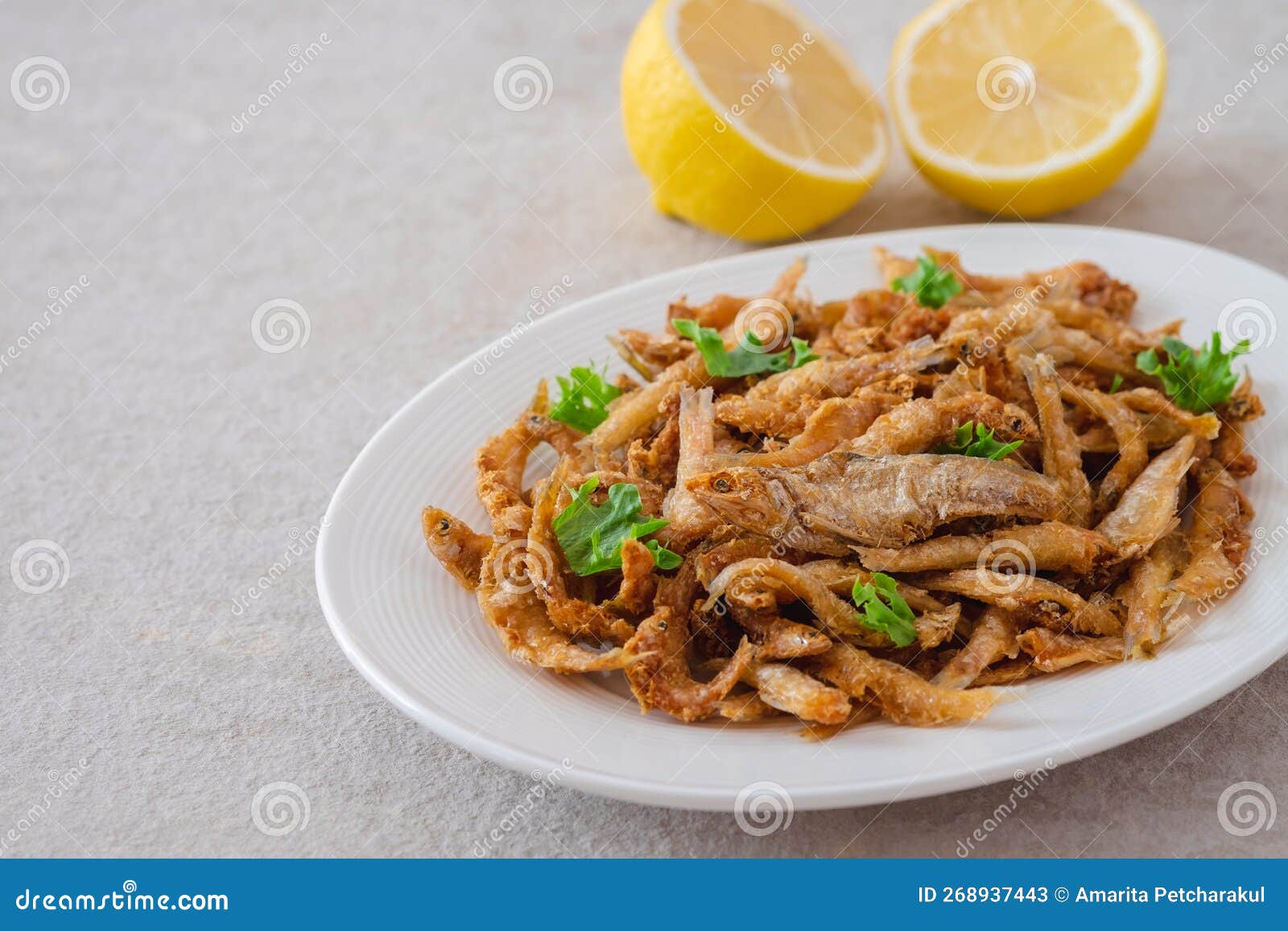 Crispy Fried Small Fish on White Plate Stock Image - Image of plate ...