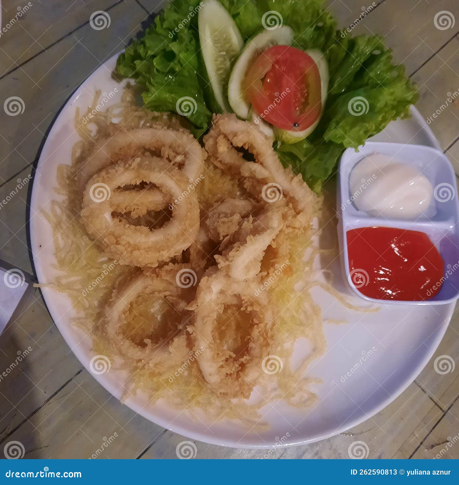 Crispy Fried Squid with Lemon is Very Delicious Stock Image - Image of ...