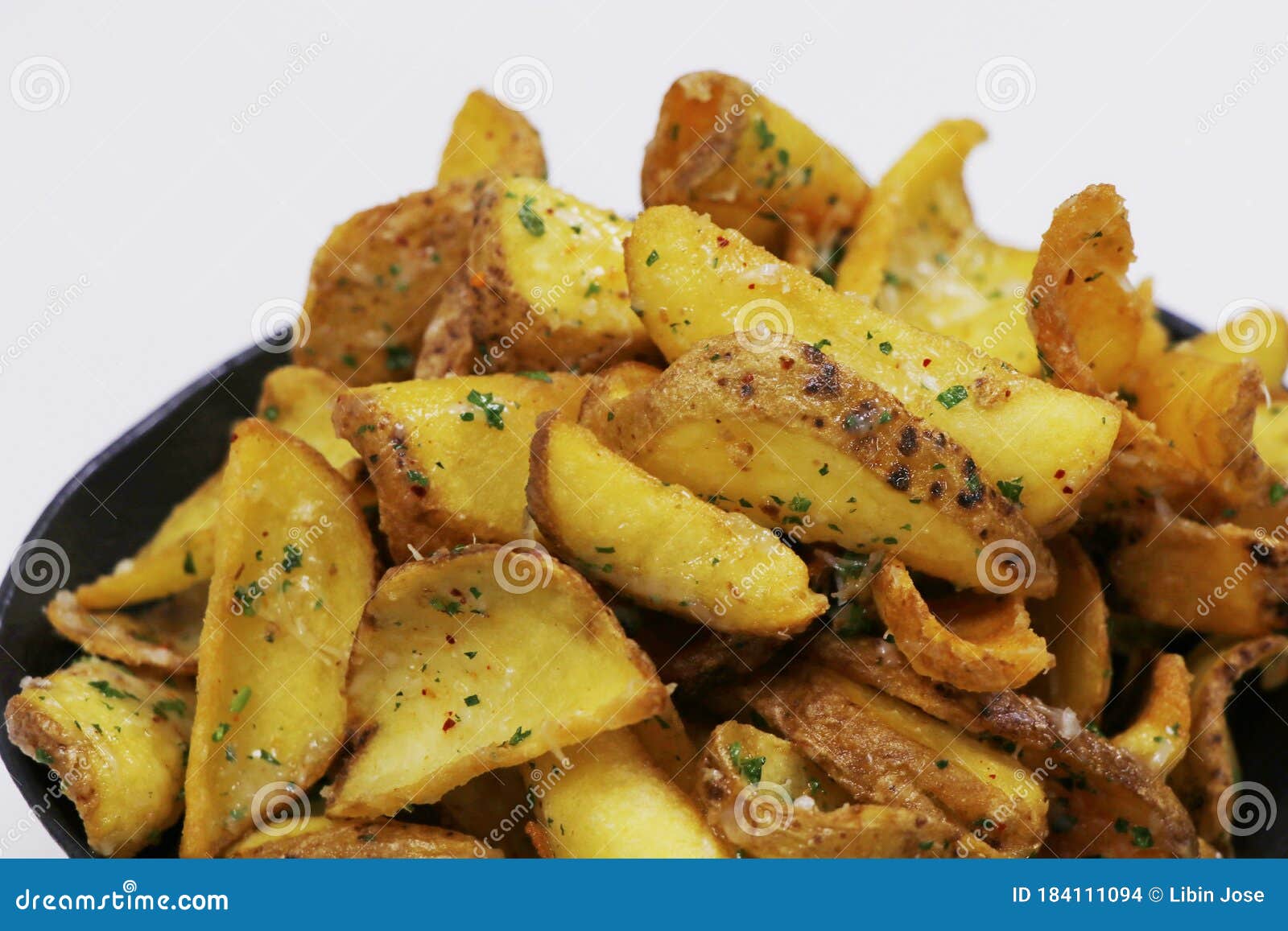 Crispy Fried Truffle Parmesan Potato Chips or Wedges Stock Photo ...
