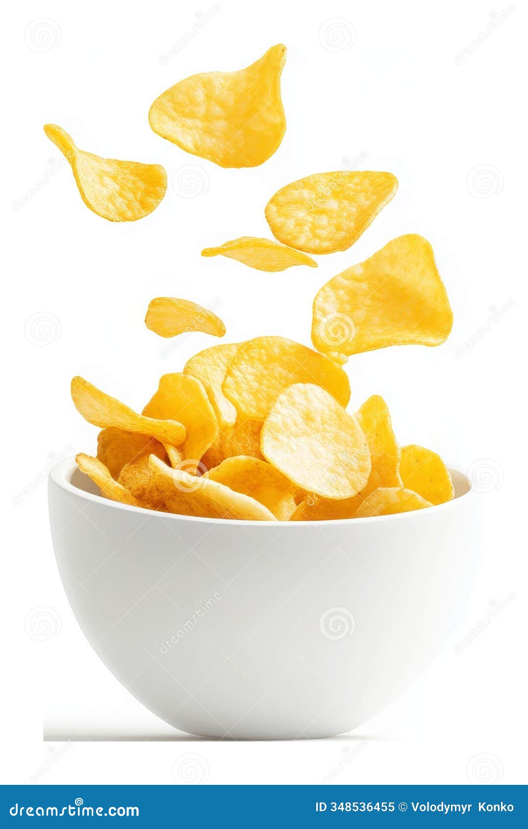 Crispy Potato Chips Falling into a White Bowl Stock Image - Image of ...