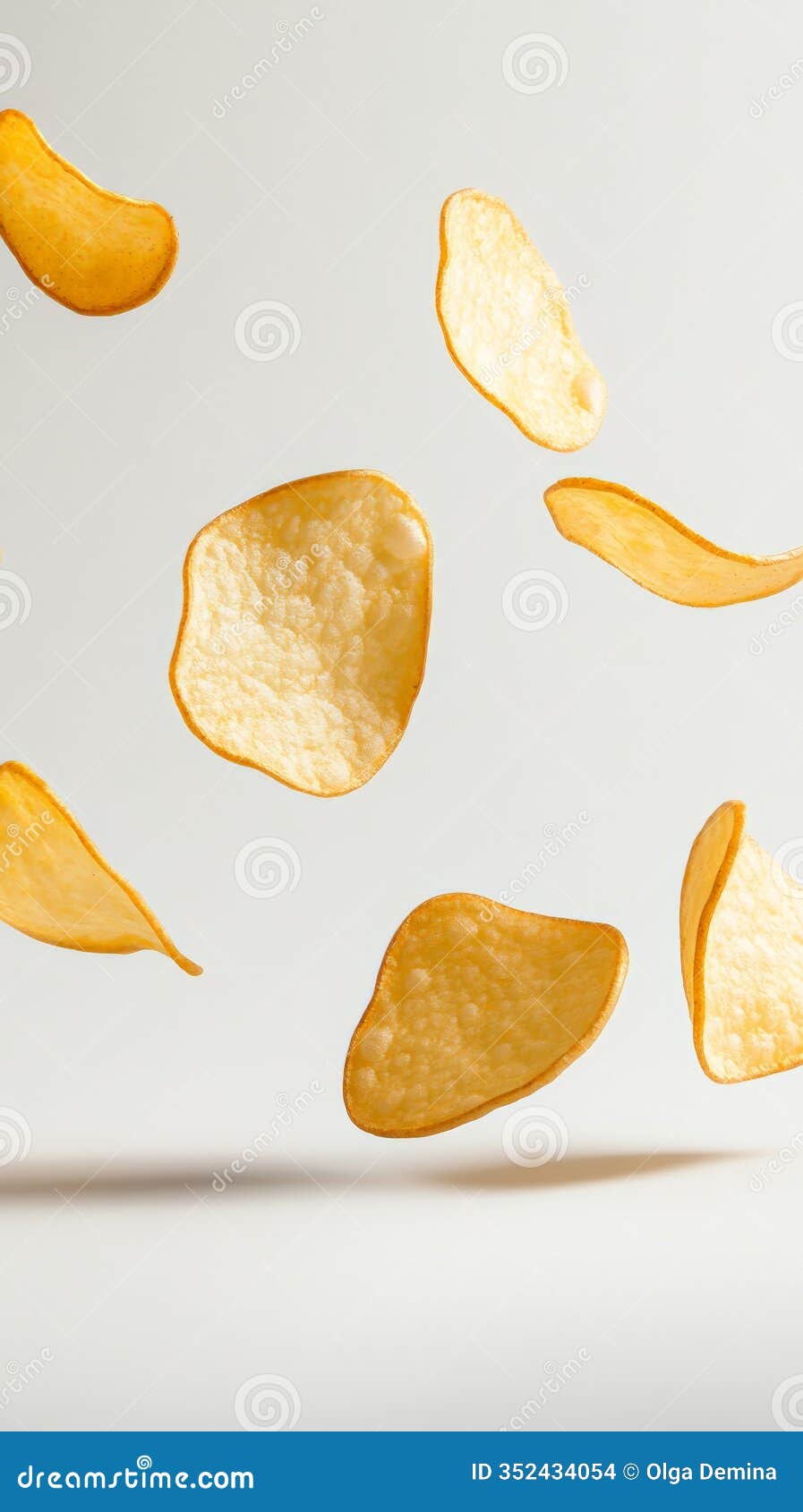 Crispy Potato Chips Floating on White Background Stock Photo - Image of ...