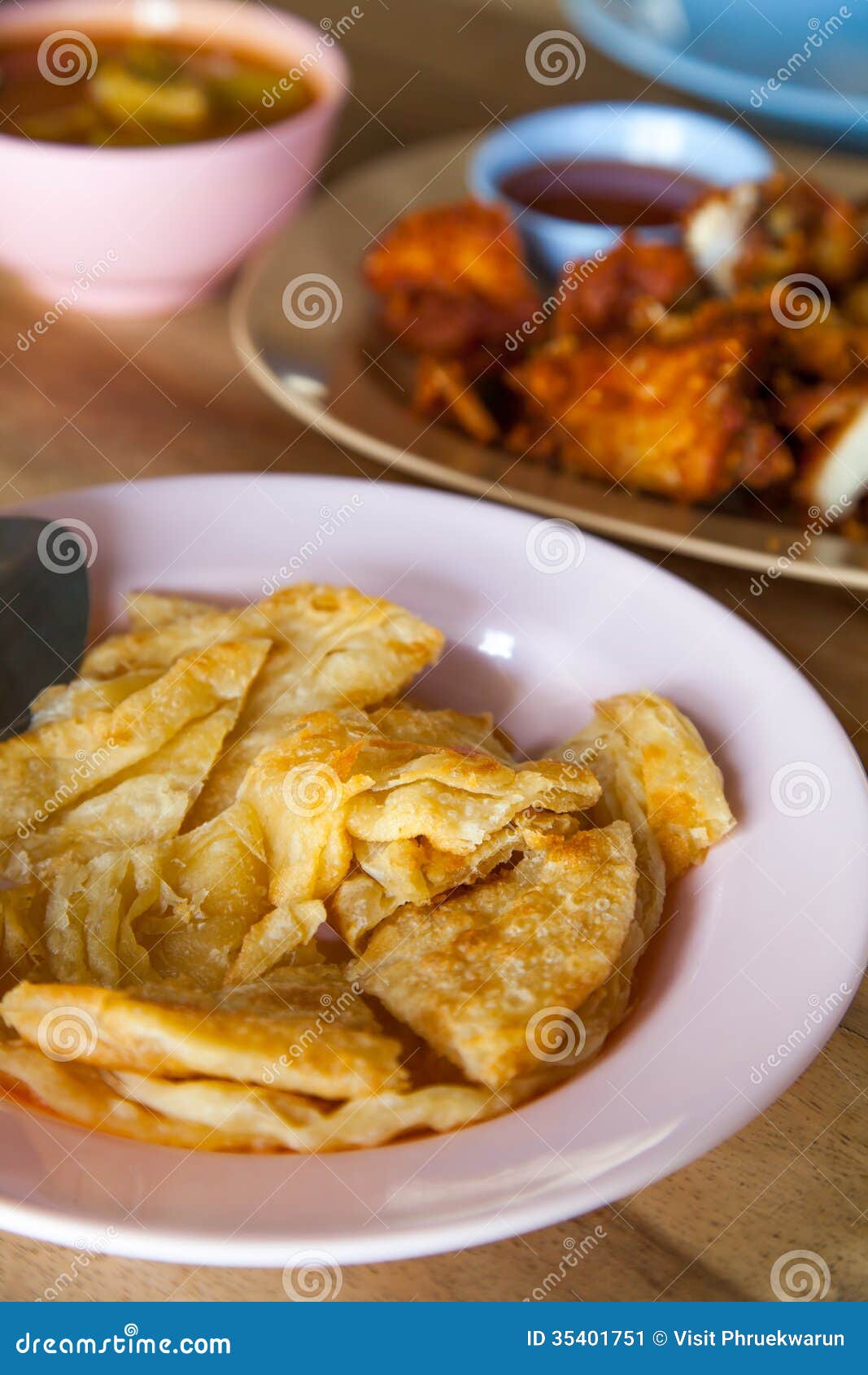 Crispy Roti on a Plate Set on a Wood Table. Stock Image - Image of east ...