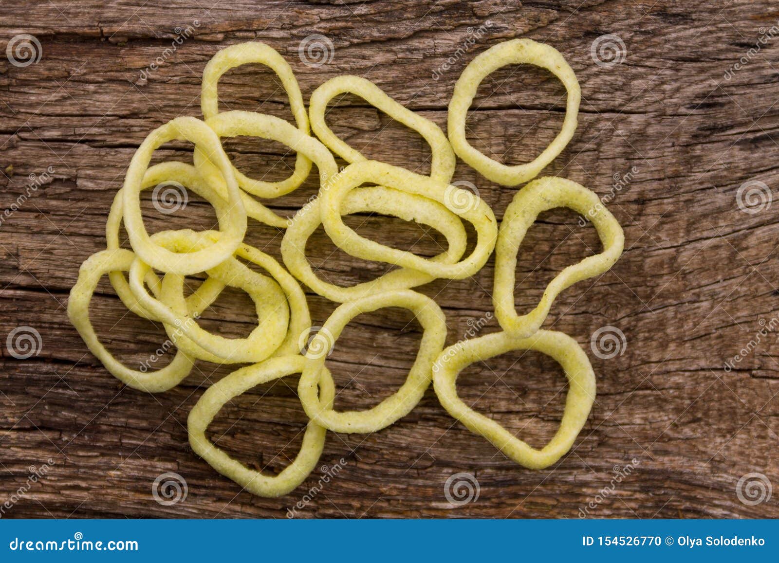 Crispy Snacks Onion Rings on Wooden Table Stock Photo - Image of cooked ...