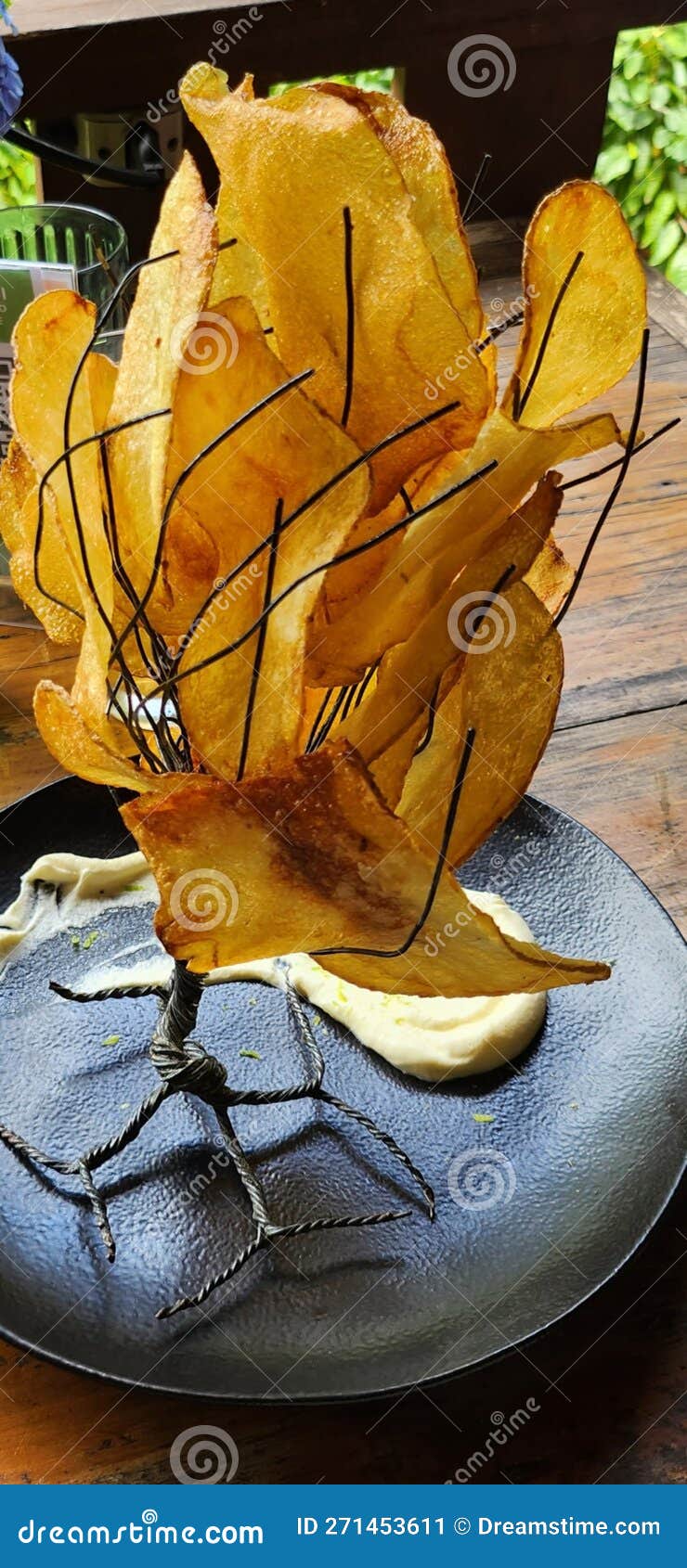 Crispy Thin French Fries Served in Tree Shape with Cream Sauce Stock ...