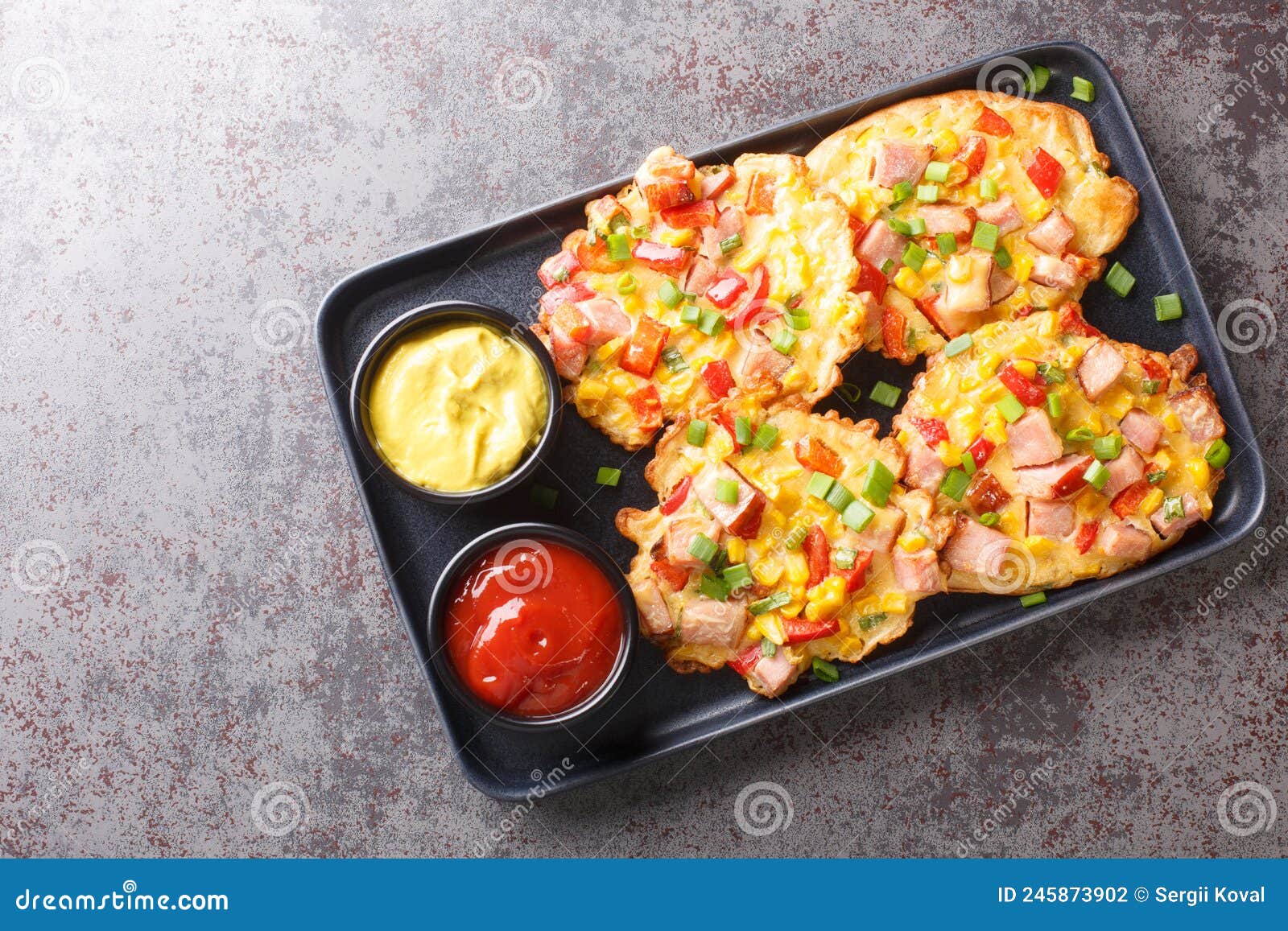 Crispy Vegetable Fritters with Ham Close-up on a Plate. Horizontal Top ...