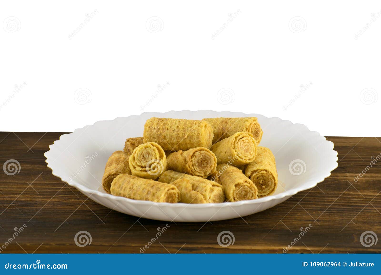 Crispy Wafer Rolls on a White Background. Rolled Viennese Waffles on ...