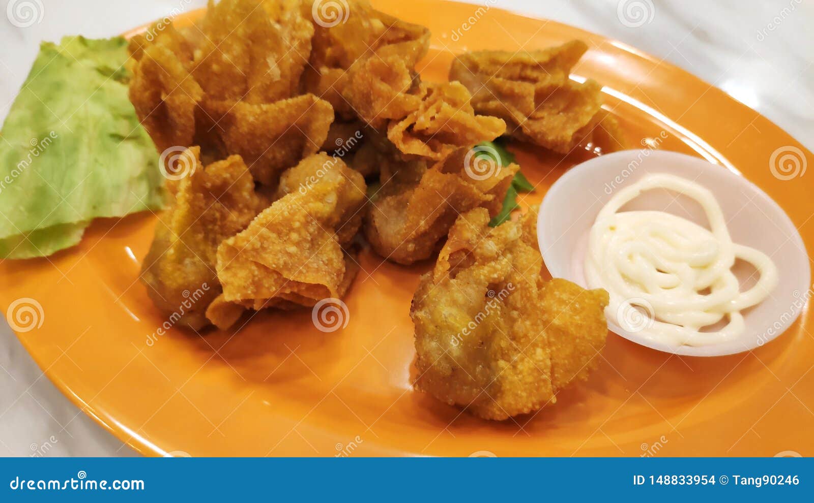 Crispy wantons on plate stock photo. Image of crispy - 148833954