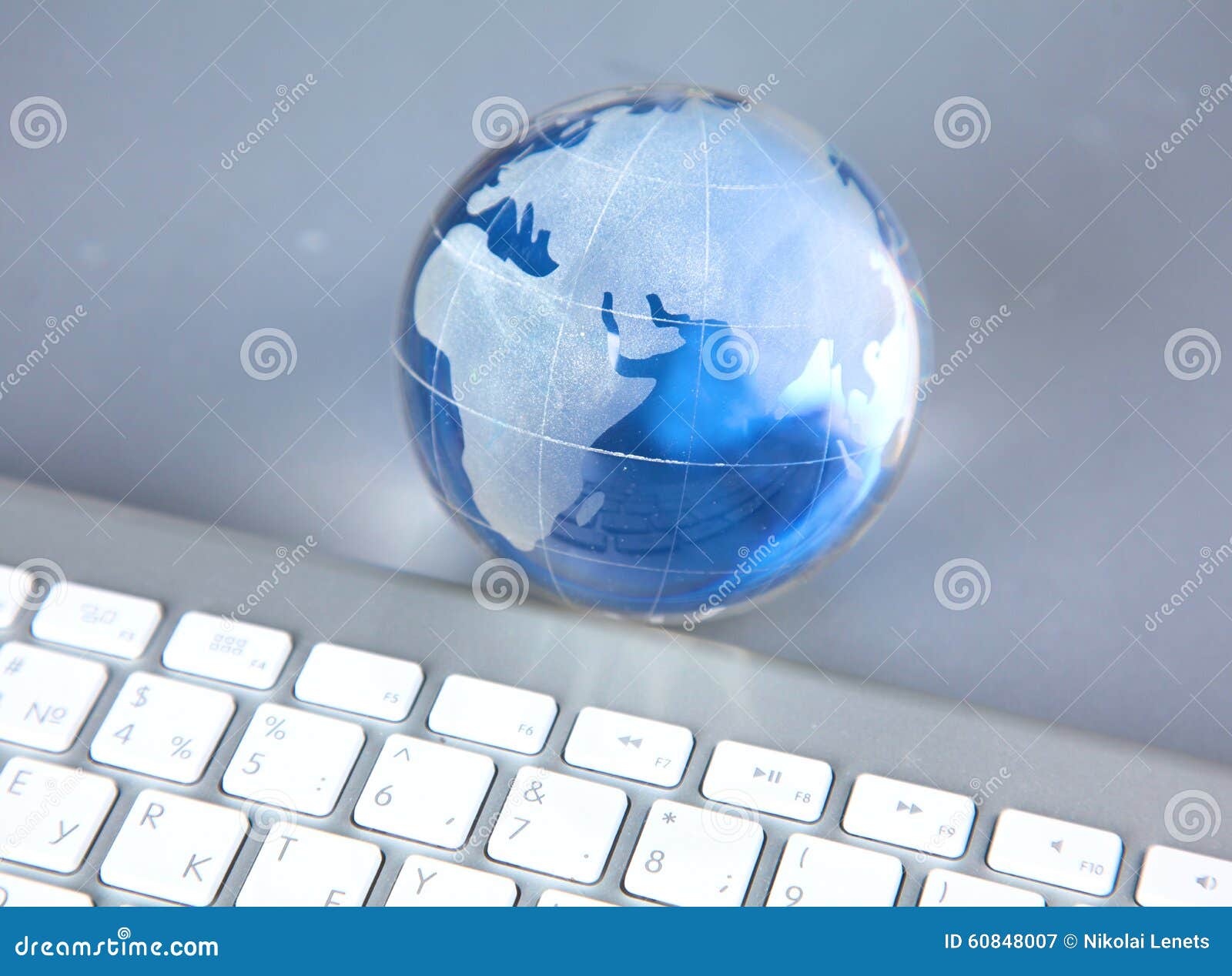 Cristal Globe of the Earth on a Computer Stock Image - Image of ...