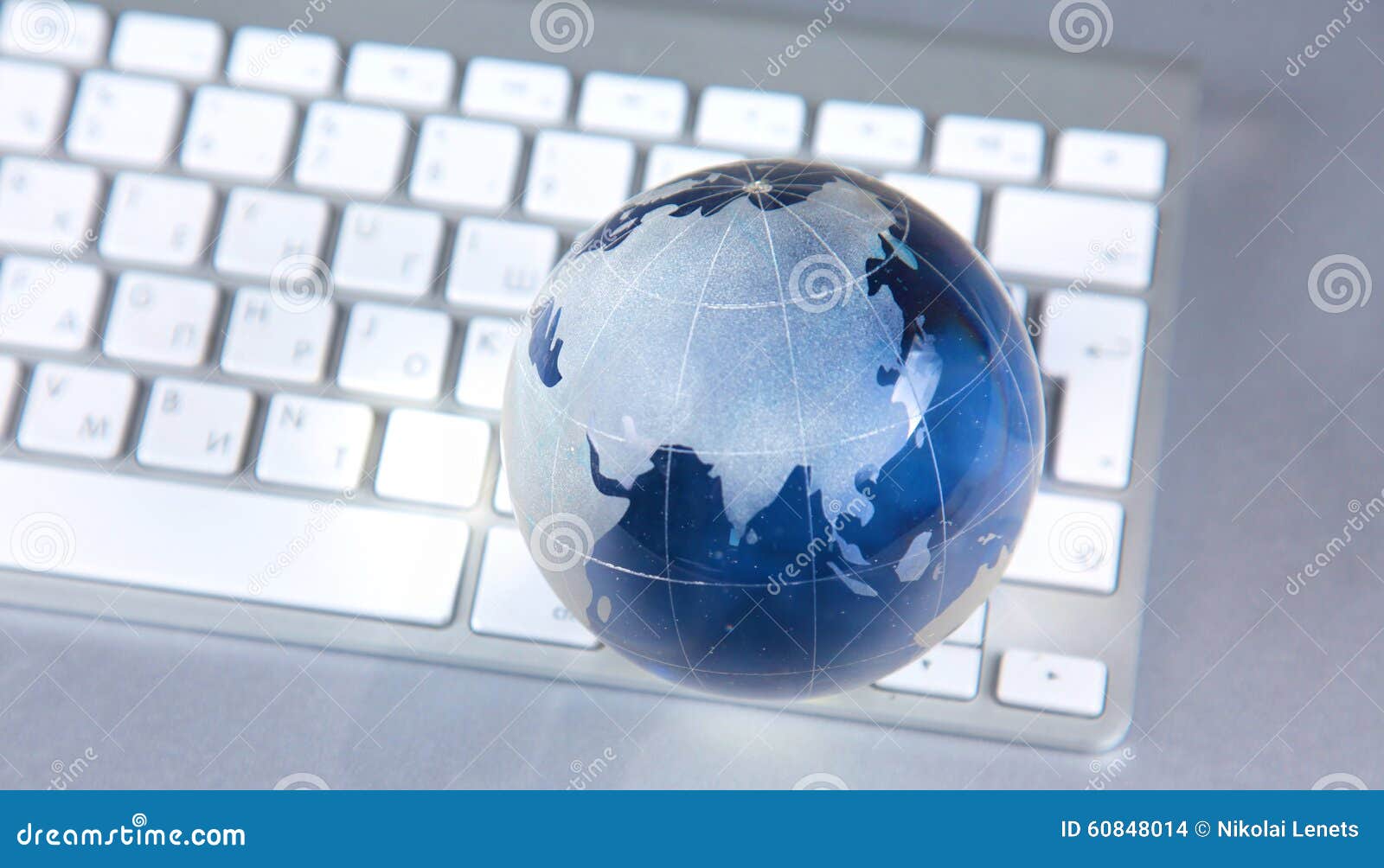 Cristal Globe of the Earth on a Computer Stock Photo - Image of ...