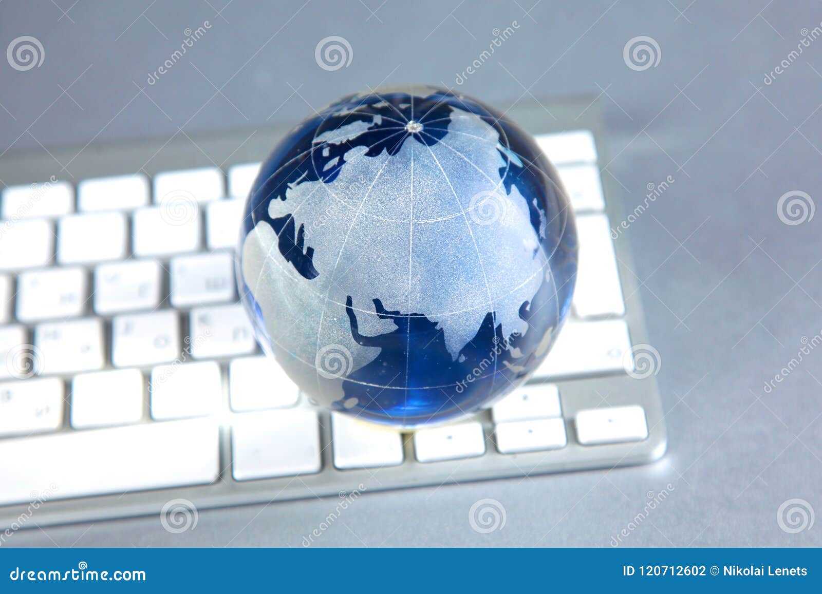 Cristal Globe of the Earth on a Computer Stock Photo - Image of ...