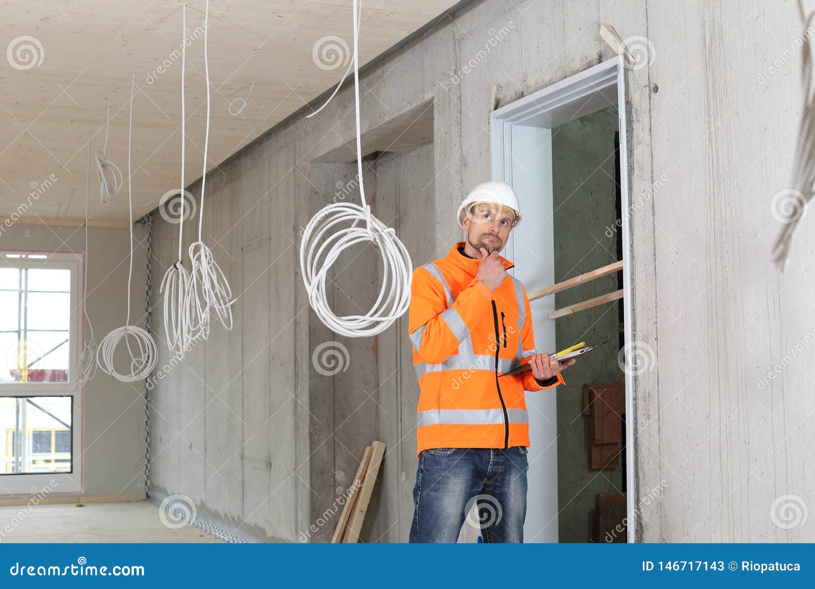 Critical Construction Expert Appraiser Checking a Constructin Site ...