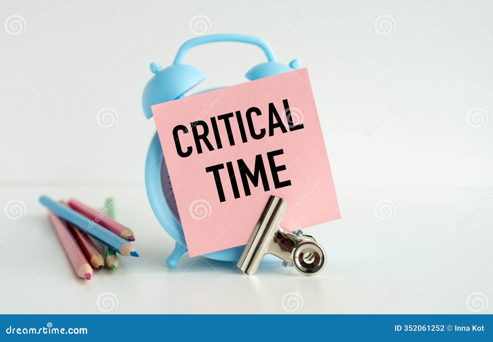 Critical Time - Text on Light White Background with Blue Alarm Clock ...