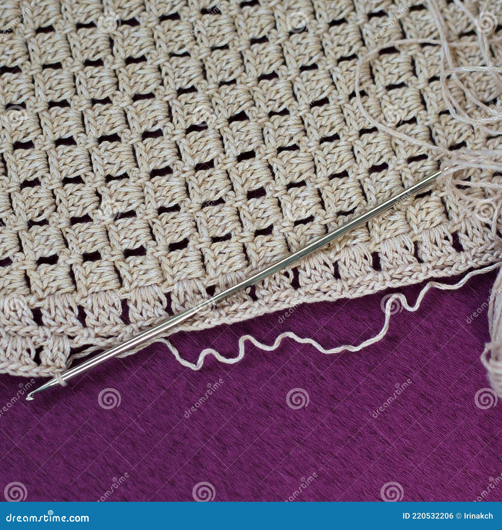 Crocheting with Beige Cotton Threads on a Purple Background Stock Photo ...