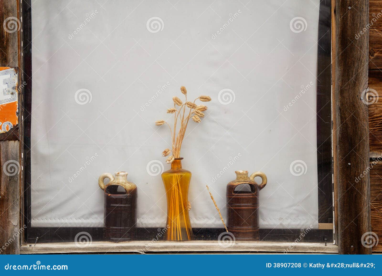Crockery Jugs in a Window Display Stock Photo - Image of weathered ...