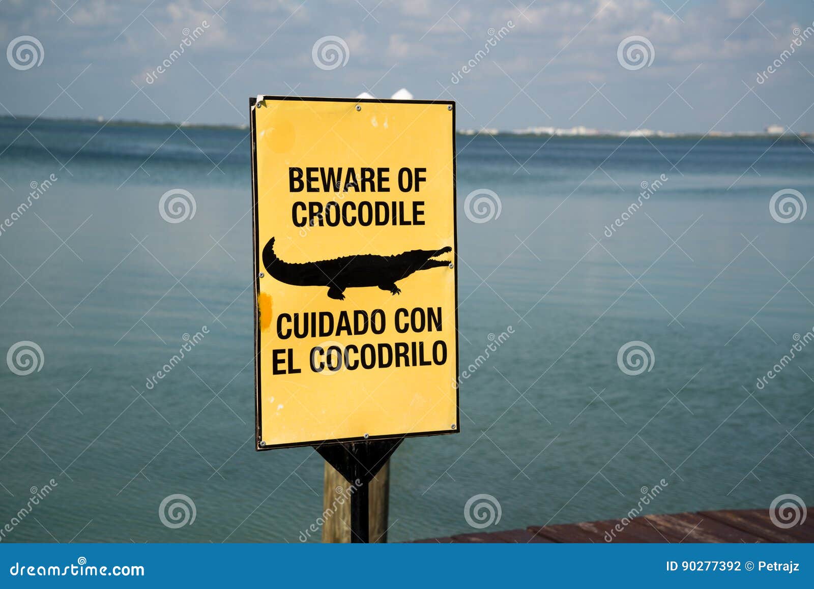 Crocodile warning sign stock photo. Image of caution - 90277392