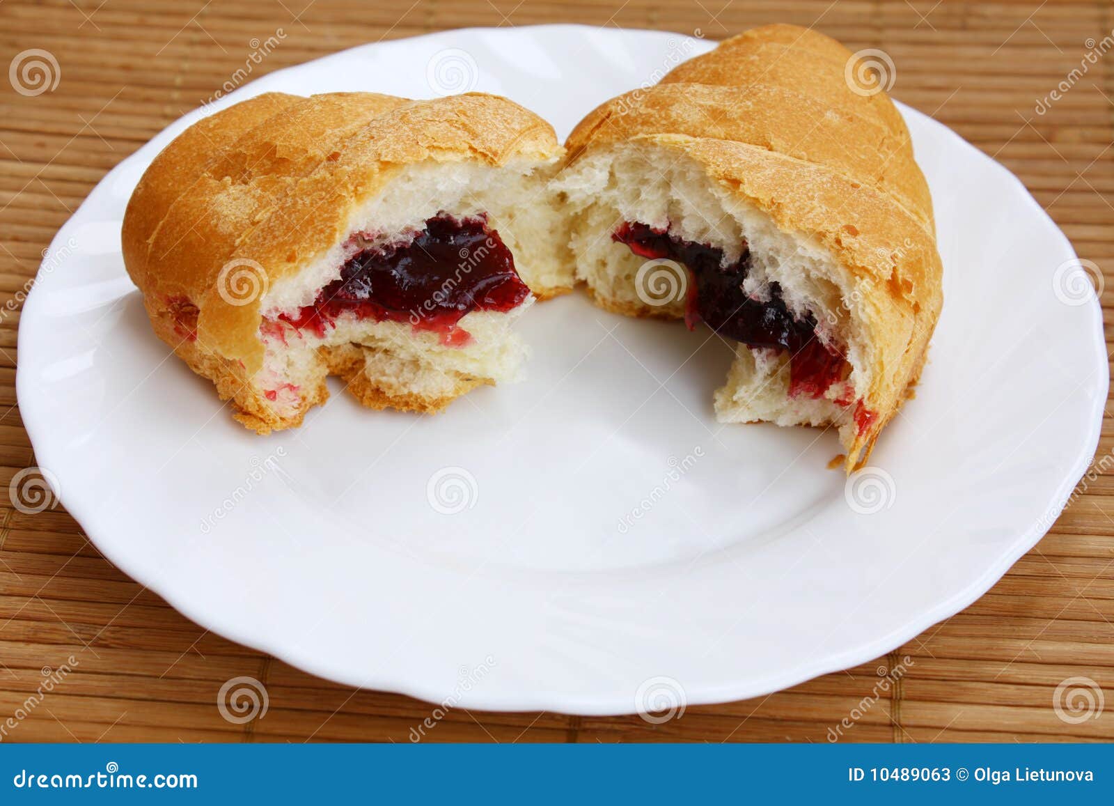 Croissant Broken Half-and-half on a Plate Stock Image - Image of drink ...