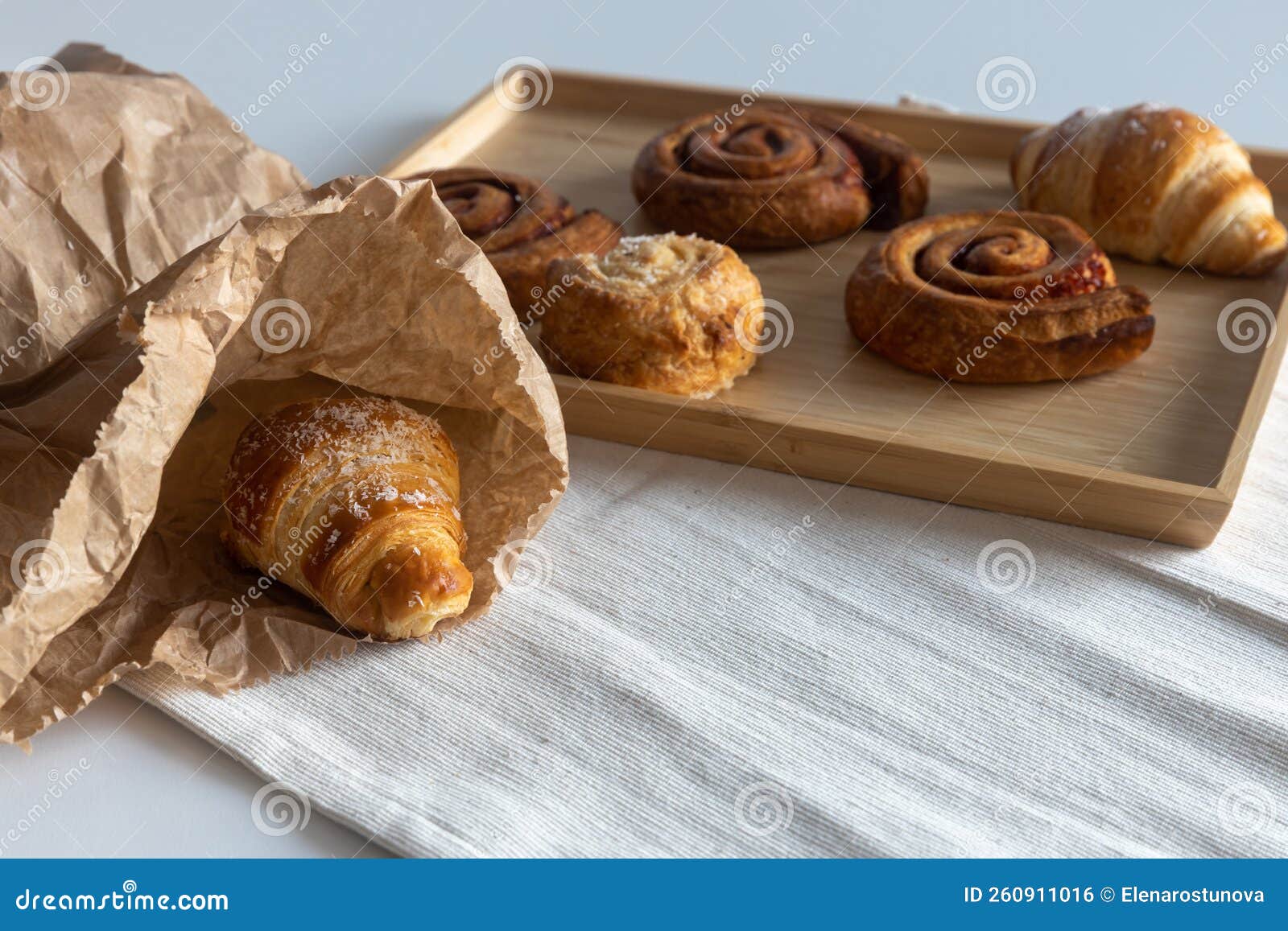 Croissant in a Craft Bag on the Table Stock Photo - Image of bread ...