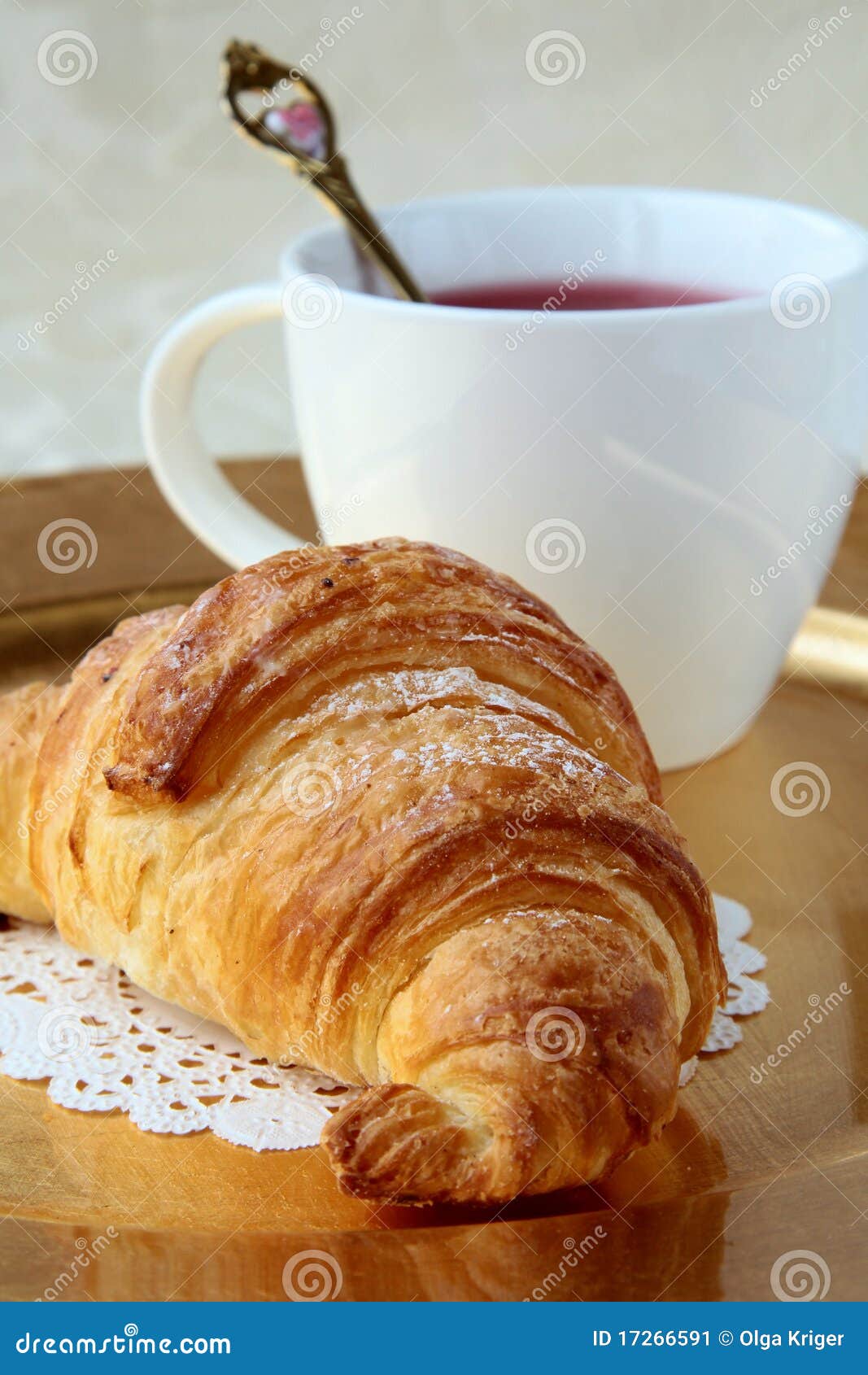 Croissant and a cup of tea stock image. Image of gourmet - 17266591